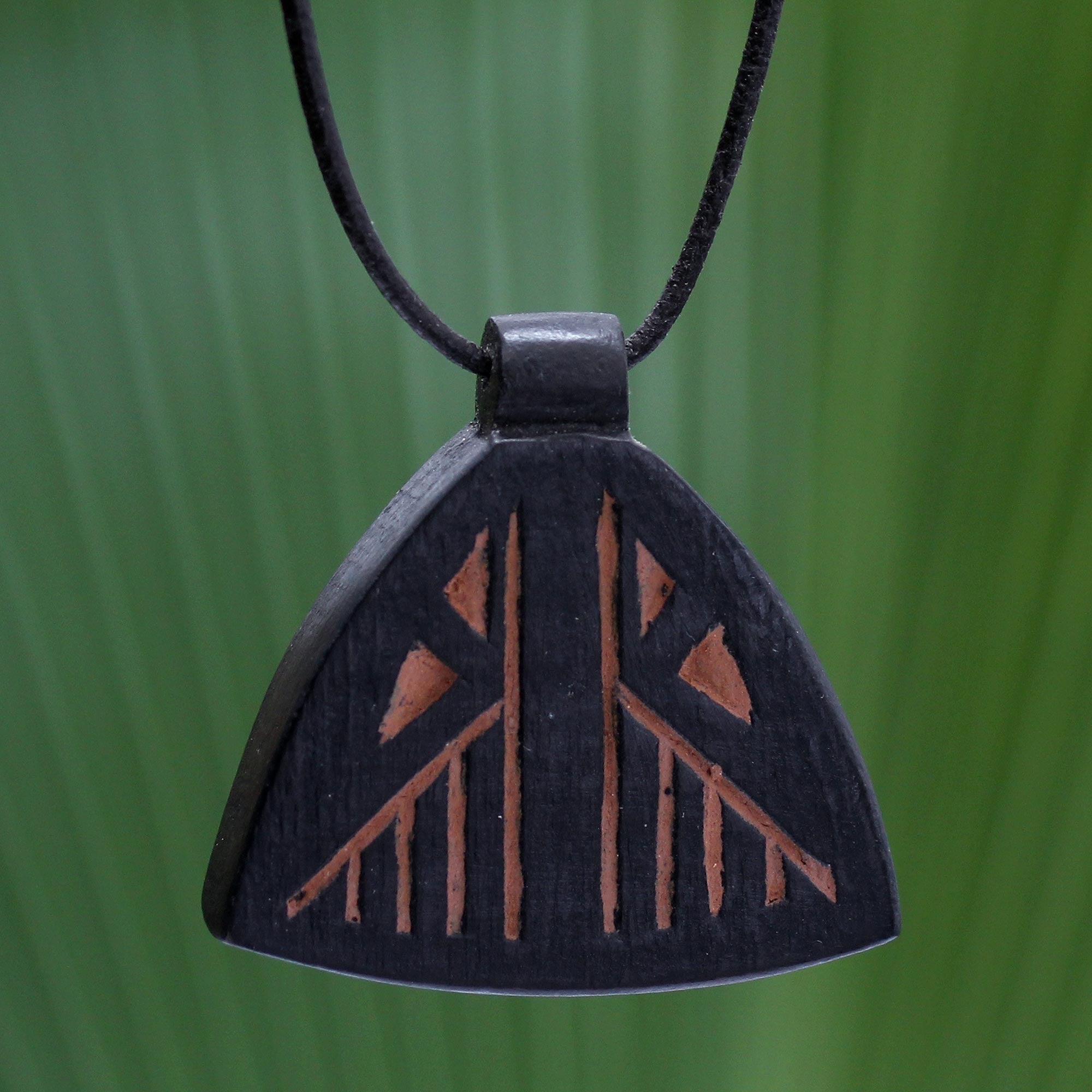NOVICA Mframadan Teak Wood pendant necklace | GreaterGood