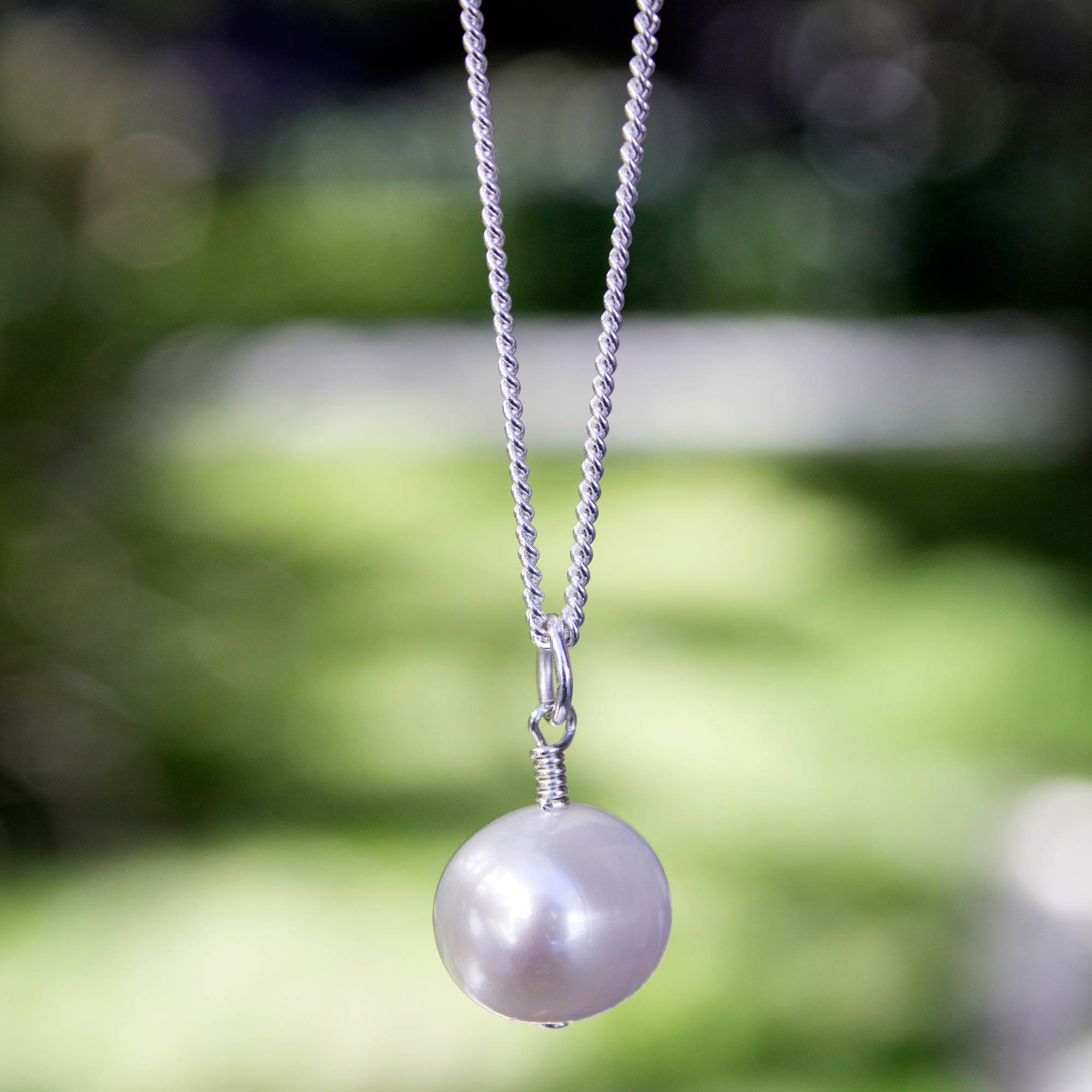 NOVICA Radiant Purity White Pearl Necklace | GreaterGood