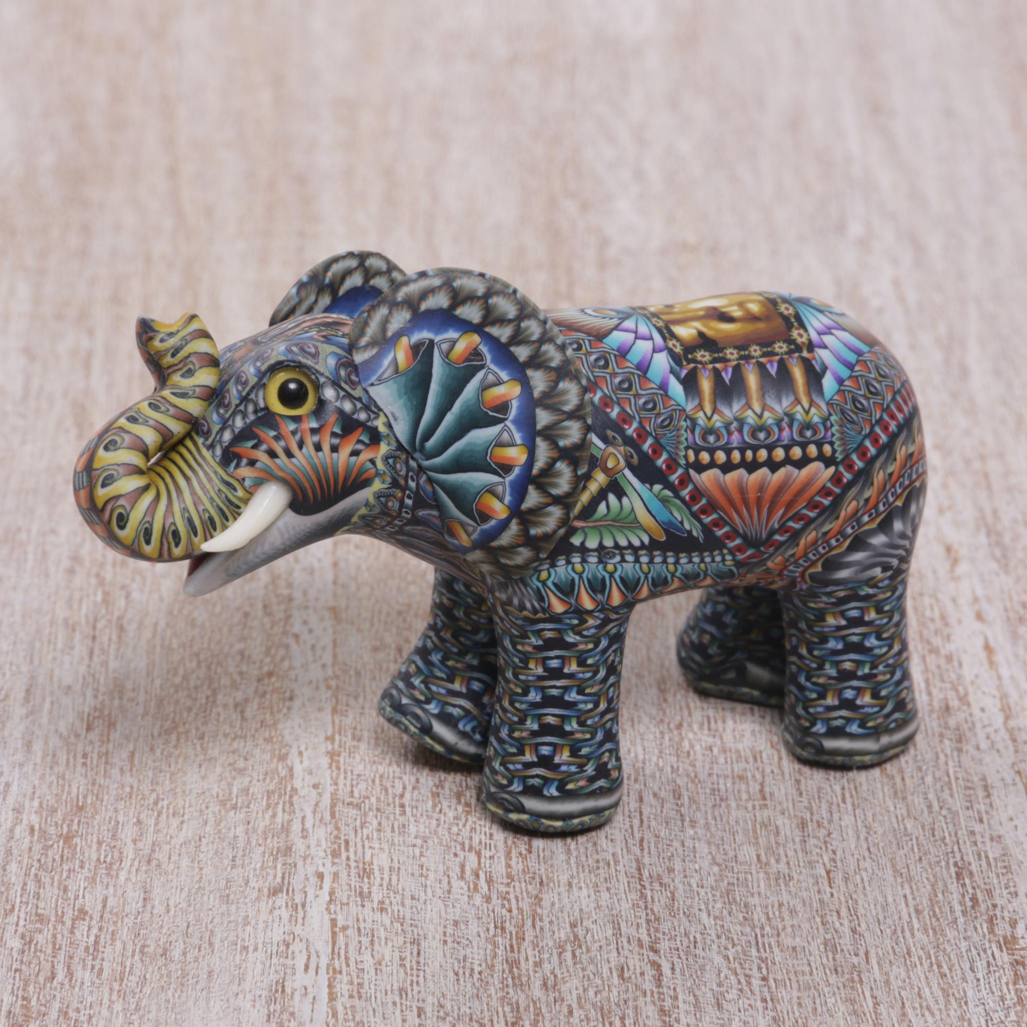 NOVICA Vibrant Baby Elephant Handcrafted Polymer Clay Elephant ...