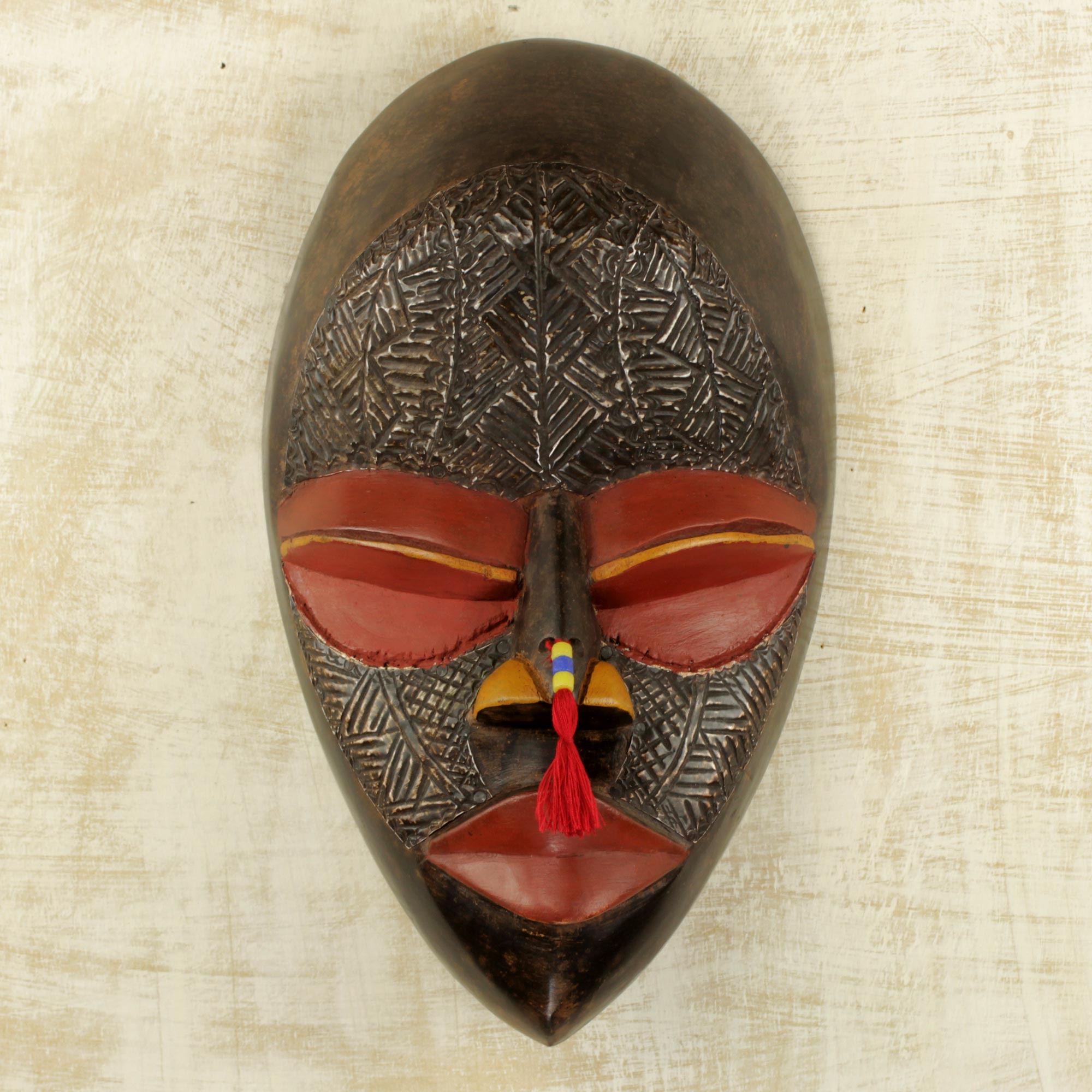 NOVICA End to Calamity Hand Carved Wood Wall Mask | GreaterGood